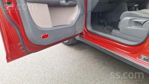 Red Volkswagen Touran 2007 in Riga, with an engine capacity of 1.90 L and mileage of 399 thousand km for 2300 €, photo 25 on AUTOMOTO.COM.LV