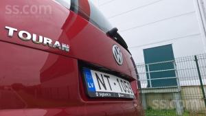 Red Volkswagen Touran 2007 in Riga, with an engine capacity of 1.90 L and mileage of 399 thousand km for 2300 €, photo 32 on AUTOMOTO.COM.LV