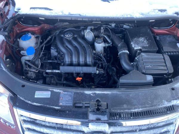 Red Volkswagen Touran 2008 in Siauliai, with an engine capacity of 2.00 L and mileage of 267 thousand km for 2850 €, photo 11 on AUTOMOTO.COM.LV