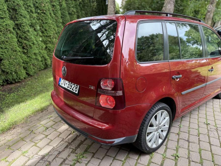 Sarkans Volkswagen Touran 2008 Rīga, ar dzinēja tilpumu 1.39 L un nobraukumu 301 tūkst. km par 2550 €, foto 9 vietnē AUTOMOTO.COM.LV