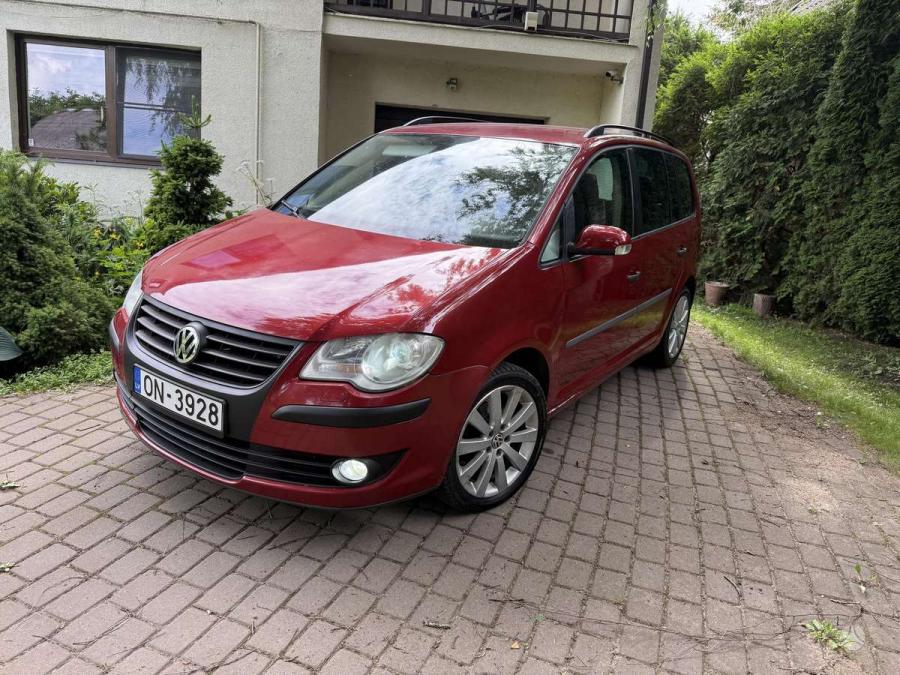 Sarkans Volkswagen Touran 2008 Rīga, ar dzinēja tilpumu 1.39 L un nobraukumu 301 tūkst. km par 2550 €, foto 10 vietnē AUTOMOTO.COM.LV