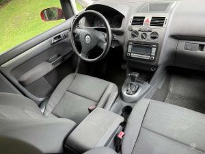 Sarkans Volkswagen Touran 2008 Rīga, ar dzinēja tilpumu 1.39 L un nobraukumu 301 tūkst. km par 2550 €, foto 14 vietnē AUTOMOTO.COM.LV