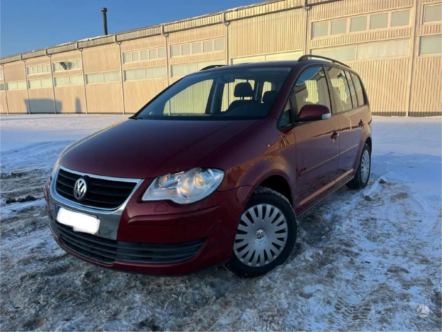 Red Volkswagen Touran 2009 in Taurage, with an engine capacity of 1.40 L and mileage of 198 thousand km for 2550 €, photo 1 on AUTOMOTO.COM.LV