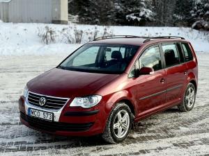 Red Volkswagen Touran 2010 in Vilnius, with an engine capacity of 1.90 L and mileage of 275 thousand km for 2800 €, photo  on AUTOMOTO.COM.LV