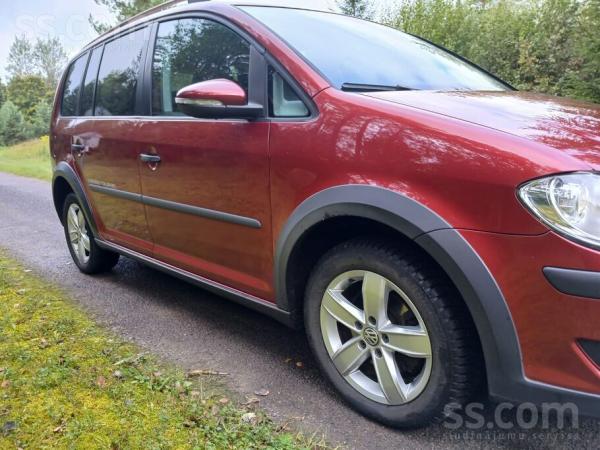 Красный Фольксваген Туран 2010 в Лудза, объемом двигателя 1.90 л и пробегом 211 тыс. км за 4890 €, фото 11 на AUTOMOTO.COM.LV