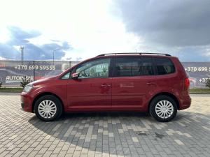 Red Volkswagen Touran 2011 in Siauliai, with an engine capacity of 1.39 L and mileage of 209 thousand km for 5200 €, photo 4 on AUTOMOTO.COM.LV