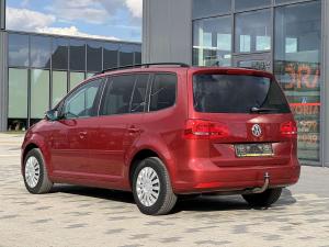 Red Volkswagen Touran 2011 in Siauliai, with an engine capacity of 1.39 L and mileage of 209 thousand km for 5200 €, photo 7 on AUTOMOTO.COM.LV