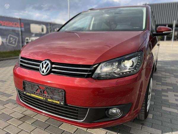 Red Volkswagen Touran 2011 in Siauliai, with an engine capacity of 1.39 L and mileage of 209 thousand km for 5200 €, photo 10 on AUTOMOTO.COM.LV