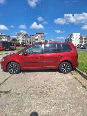 Red Volkswagen Touran 2011 in Vilnius, with an engine capacity of 1.60 L and mileage of 272 thousand km for 4700 €, photo  on AUTOMOTO.COM.LV