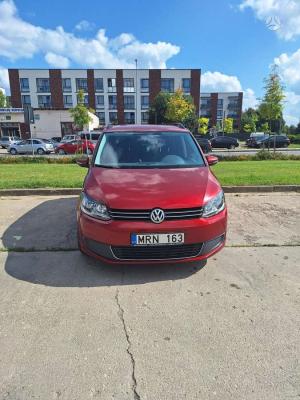Red Volkswagen Touran 2011 in Vilnius, with an engine capacity of 1.60 L and mileage of 272 thousand km for 4700 €, photo 3 on AUTOMOTO.COM.LV