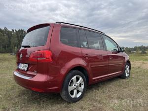 Sarkans Volkswagen Touran 2011 Ogre, ar dzinēja tilpumu 1.60 L un nobraukumu 235 tūkst. km par 5750 €, foto 7 vietnē AUTOMOTO.COM.LV