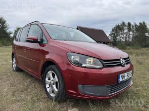 Sarkans Volkswagen Touran 2011 Ogre, ar dzinēja tilpumu 1.60 L un nobraukumu 235 tūkst. km par 5750 €, foto 9 vietnē AUTOMOTO.COM.LV