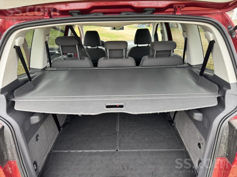 Sarkans Volkswagen Touran 2011 Ogre, ar dzinēja tilpumu 1.60 L un nobraukumu 235 tūkst. km par 5750 €, foto 14 vietnē AUTOMOTO.COM.LV