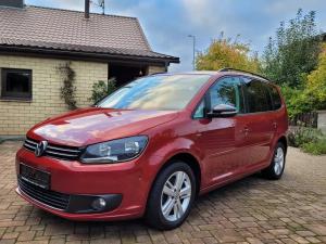 Red Volkswagen Touran 2012 in Saldus, with an engine capacity of 2.00 L and mileage of 238 thousand km for 8500 €, photo  on AUTOMOTO.COM.LV