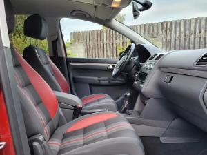 Red Volkswagen Touran 2012 in Saldus, with an engine capacity of 2.00 L and mileage of 238 thousand km for 8500 €, photo 17 on AUTOMOTO.COM.LV
