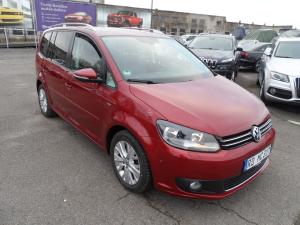 Red Volkswagen Touran 2013 in Klaipeda, with an engine capacity of 1.40 L and mileage of 215 thousand km for 5590 €, photo  on AUTOMOTO.COM.LV