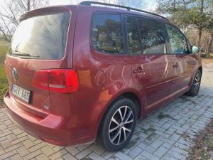 Red Volkswagen Touran 2013 in Vilnius, with an engine capacity of 1.60 L and mileage of 277 thousand km for 4600 €, photo 6 on AUTOMOTO.COM.LV