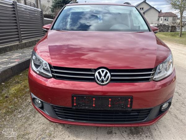 Red Volkswagen Touran 2014 in Alytus, with an engine capacity of 1.60 L and mileage of 186 thousand km for 6450 €, photo 4 on AUTOMOTO.COM.LV