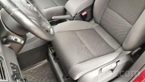 Sarkans Volkswagen Touran 2014 Rīga, ar dzinēja tilpumu 1.60 L un nobraukumu 277 tūkst. km par 5350 €, foto 13 vietnē AUTOMOTO.COM.LV
