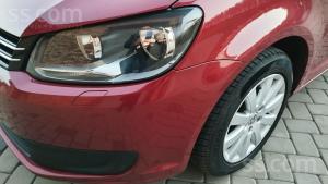 Sarkans Volkswagen Touran 2014 Rīga, ar dzinēja tilpumu 1.60 L un nobraukumu 277 tūkst. km par 5350 €, foto 31 vietnē AUTOMOTO.COM.LV