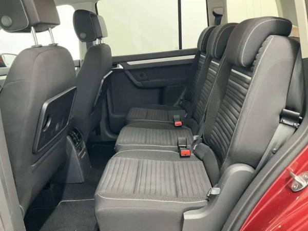 Red Volkswagen Touran 2014 in Marupe, with an engine capacity of 1.60 L and mileage of 275 thousand km for 7950 €, photo 7 on AUTOMOTO.COM.LV
