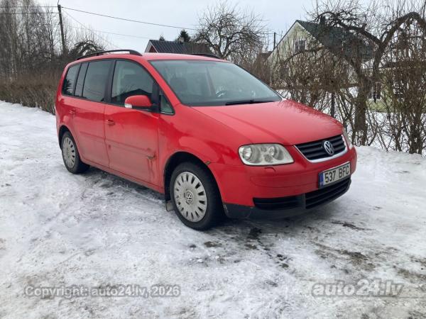 Red Volkswagen Touran 2005 in Tartu, with an engine capacity of 1.90 L and mileage of 0 thousand km for 1499 €, photo 3 on AUTOMOTO.COM.LV
