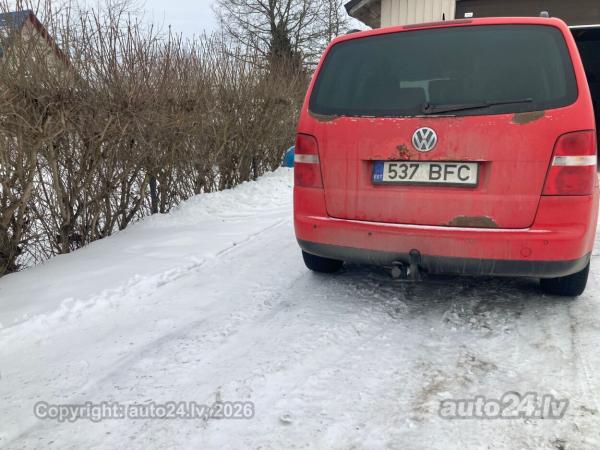 Red Volkswagen Touran 2005 in Tartu, with an engine capacity of 1.90 L and mileage of 0 thousand km for 1499 €, photo 7 on AUTOMOTO.COM.LV