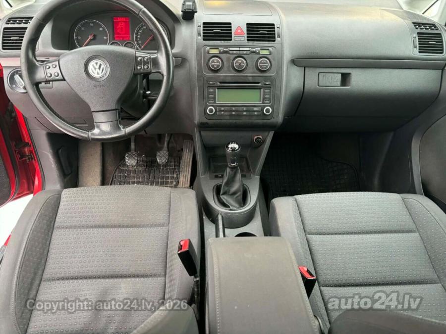Sarkans Volkswagen Touran 2005 Tartu, ar dzinēja tilpumu 1.90 L un nobraukumu 0 tūkst. km par 1499 €, foto 19 vietnē AUTOMOTO.COM.LV