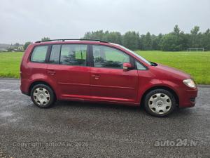 Red Volkswagen Touran 2007 in Tartu, with an engine capacity of 1.60 L and mileage of 189 thousand km for 2400 €, photo 4 on AUTOMOTO.COM.LV