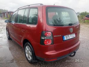 Sarkans Volkswagen Touran 2010 Veru, ar dzinēja tilpumu 2.00 L un nobraukumu 268 tūkst. km par 5200 €, foto 4 vietnē AUTOMOTO.COM.LV