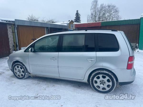 Volkswagen Touran 2006 Tartu, ar dzinēja tilpumu 2.00 L un nobraukumu 351 tūkst. km par 2000 €, foto 3 vietnē AUTOMOTO.COM.LV