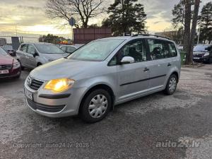 Volkswagen Touran 2009 in Tallinn, with an engine capacity of 1.90 L and mileage of 290 thousand km for 1900 €, photo  on AUTOMOTO.COM.LV