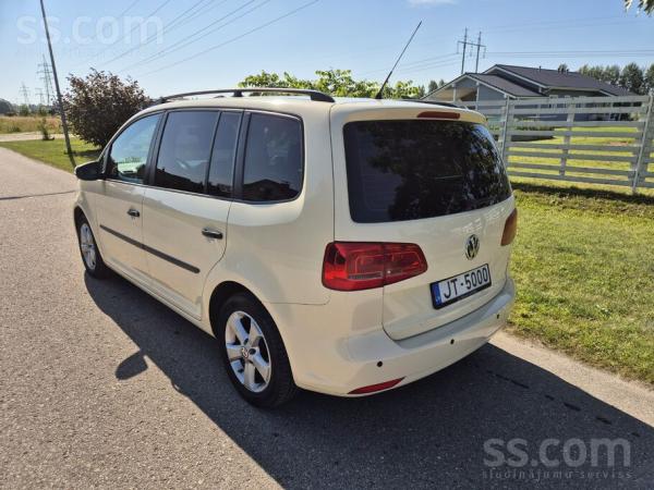 Volkswagen Touran 2014 in Riga, with an engine capacity of 2.00 L and mileage of 302 thousand km for 4500 €, photo 2 on AUTOMOTO.COM.LV
