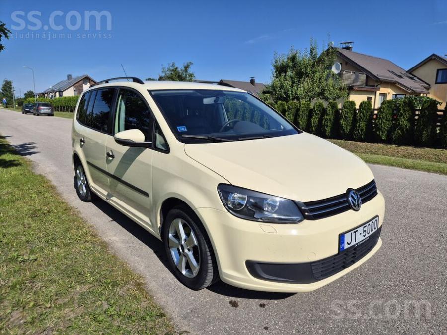 Volkswagen Touran 2014 Rīga, ar dzinēja tilpumu 2.00 L un nobraukumu 302 tūkst. km par 4500 €, foto 4 vietnē AUTOMOTO.COM.LV