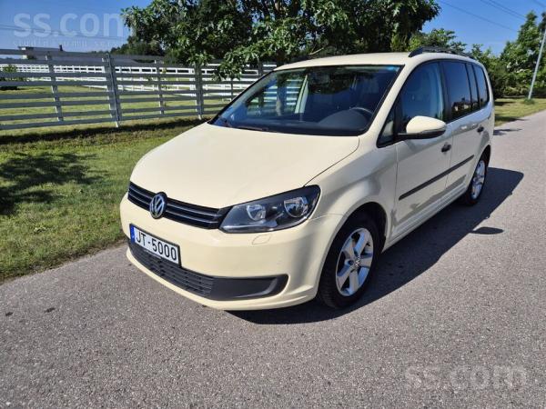 Volkswagen Touran 2014 in Riga, with an engine capacity of 2.00 L and mileage of 302 thousand km for 4500 €, photo 1 on AUTOMOTO.COM.LV