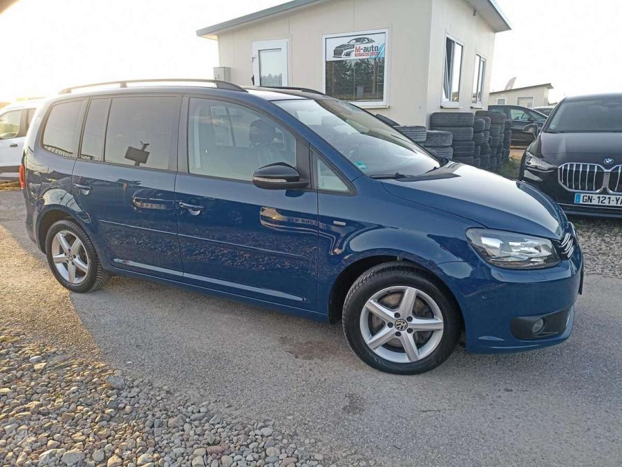 Violets Volkswagen Touran 2013 Viļņa, ar dzinēja tilpumu 1.39 L un nobraukumu 213 tūkst. km par 6450 €, foto 1 vietnē AUTOMOTO.COM.LV