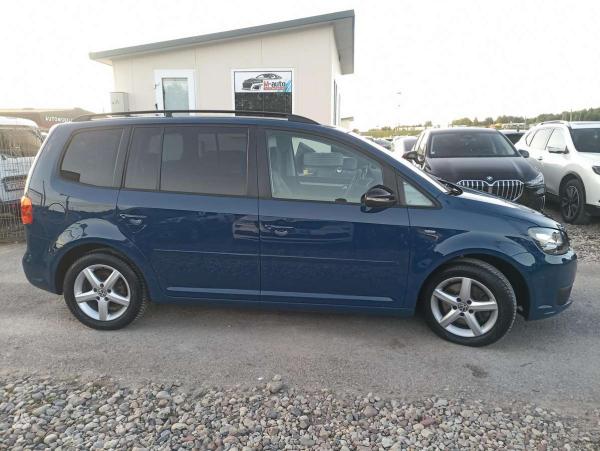 Violet Volkswagen Touran 2013 in Vilnius, with an engine capacity of 1.39 L and mileage of 213 thousand km for 6450 €, photo 5 on AUTOMOTO.COM.LV