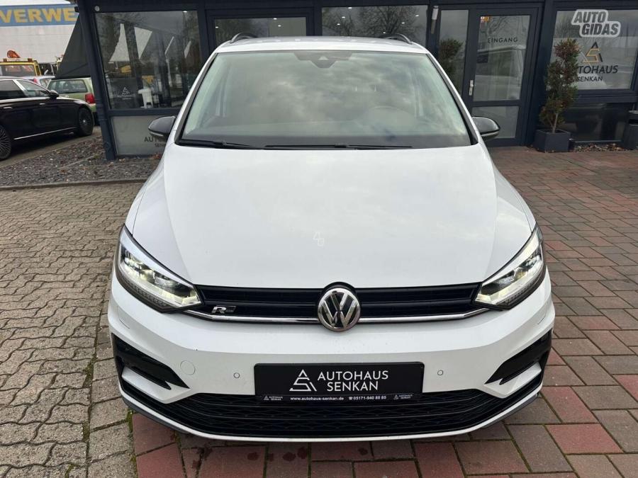 White Volkswagen Touran 2020 in Kaunas, with an engine capacity of 2.00 L and mileage of 64 thousand km for 31114 €, photo 2 on AUTOMOTO.COM.LV
