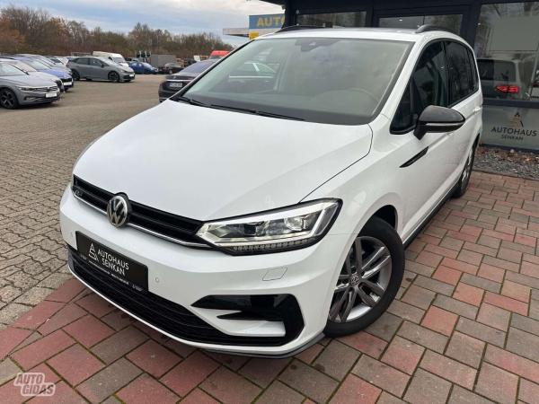 White Volkswagen Touran 2020 in Kaunas, with an engine capacity of 2.00 L and mileage of 64 thousand km for 31114 €, photo 3 on AUTOMOTO.COM.LV