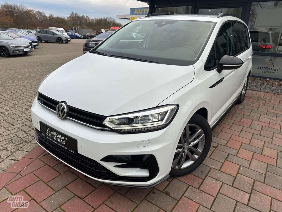White Volkswagen Touran 2020 in Kaunas, with an engine capacity of 2.00 L and mileage of 64 thousand km for 31114 €, photo 3 on AUTOMOTO.COM.LV