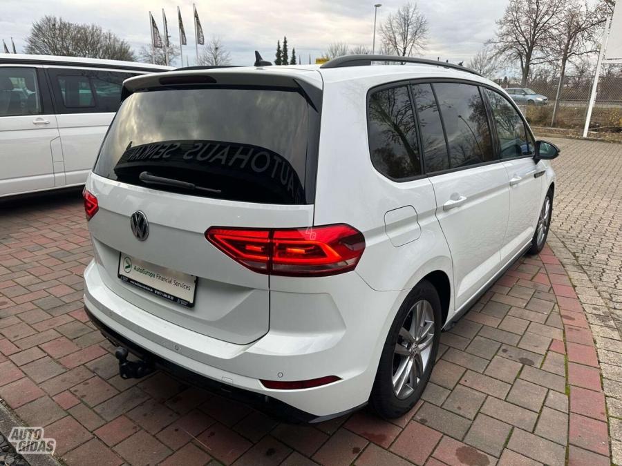 White Volkswagen Touran 2020 in Kaunas, with an engine capacity of 2.00 L and mileage of 64 thousand km for 31114 €, photo 7 on AUTOMOTO.COM.LV