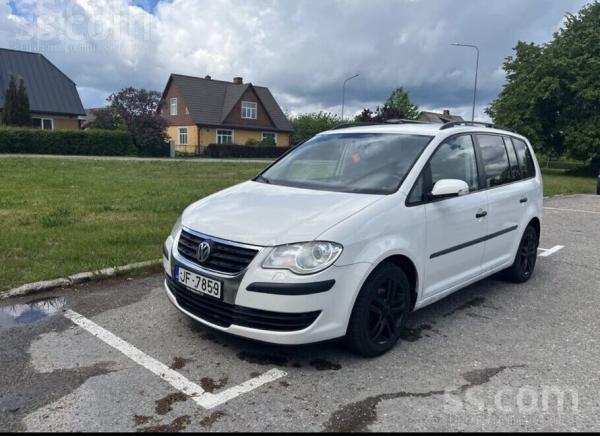 White Volkswagen Touran 2009 in Bauska, with an engine capacity of 1.90 L and mileage of 0 thousand km for 2200 €, photo 2 on AUTOMOTO.COM.LV