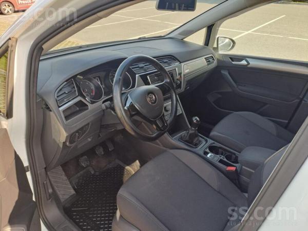 White Volkswagen Touran 2017 in Riga, with an engine capacity of 1.60 L and mileage of 203 thousand km for 7700 €, photo 6 on AUTOMOTO.COM.LV