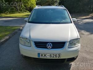White Volkswagen Touran 2005 in Riga, with an engine capacity of 1.90 L and mileage of 389 thousand km for 399 €, photo  on AUTOMOTO.COM.LV