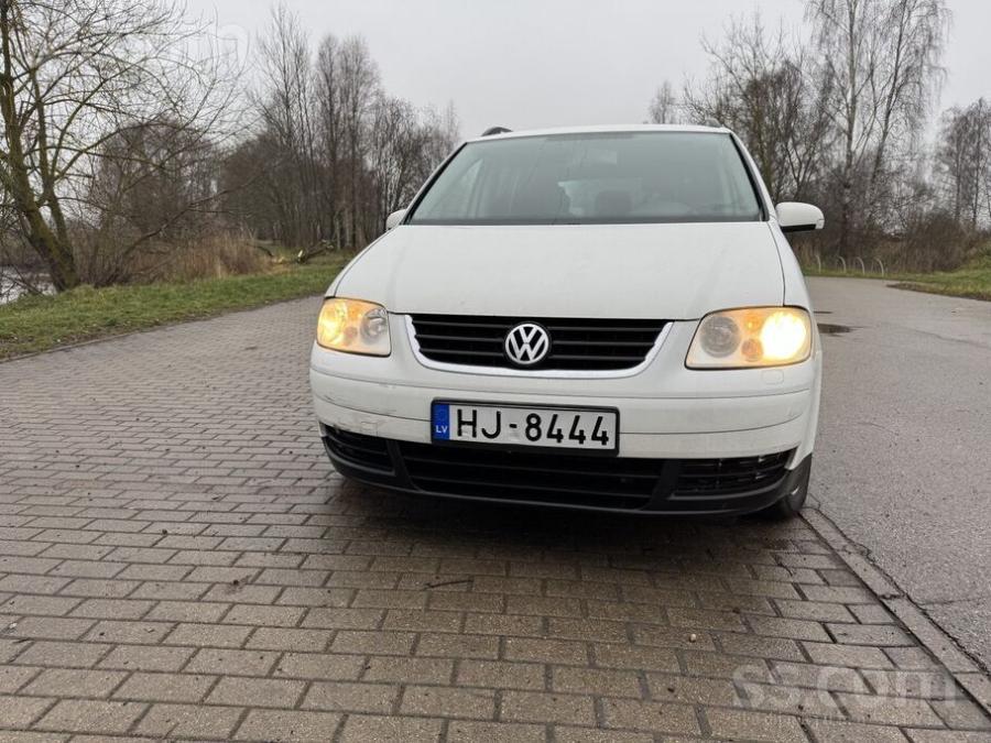 Balts Volkswagen Touran 2006 Rīga, ar dzinēja tilpumu 1.90 L un nobraukumu 291 tūkst. km par 2000 €, foto 1 vietnē AUTOMOTO.COM.LV