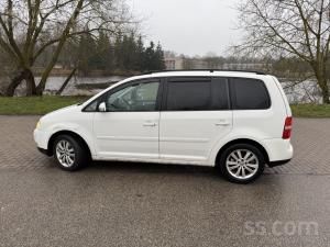 Balts Volkswagen Touran 2006 Rīga, ar dzinēja tilpumu 1.90 L un nobraukumu 291 tūkst. km par 2000 €, foto 5 vietnē AUTOMOTO.COM.LV