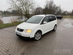 Balts Volkswagen Touran 2006 Rīga, ar dzinēja tilpumu 1.90 L un nobraukumu 291 tūkst. km par 2000 €, foto 6 vietnē AUTOMOTO.COM.LV