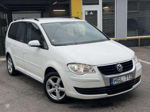 Balts Volkswagen Touran 2008 Šauļi, ar dzinēja tilpumu 1.90 L un nobraukumu 267 tūkst. km par 1450 €, foto  vietnē AUTOMOTO.COM.LV