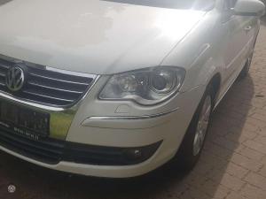 White Volkswagen Touran 2008 in Utena, with an engine capacity of 1.97 L and mileage of 285 thousand km for 2500 €, photo 4 on AUTOMOTO.COM.LV