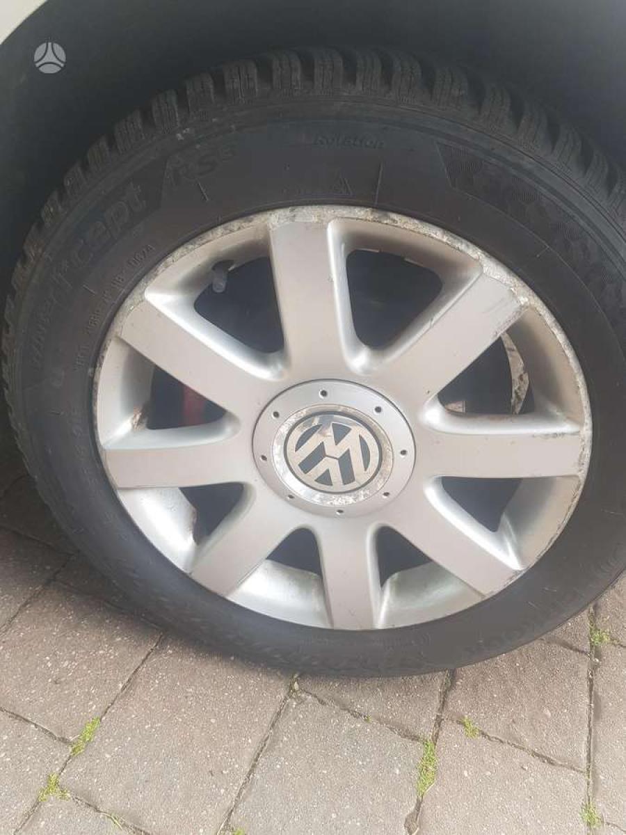White Volkswagen Touran 2008 in Utena, with an engine capacity of 1.97 L and mileage of 285 thousand km for 2500 €, photo 14 on AUTOMOTO.COM.LV